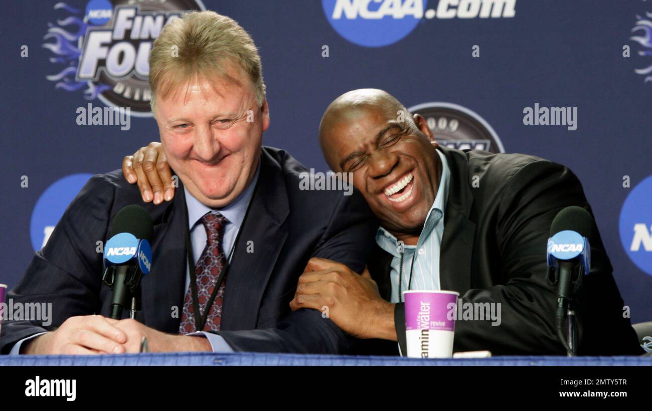 FILE - In this April 6, 2009, file photo, former NBA players Earvin ...