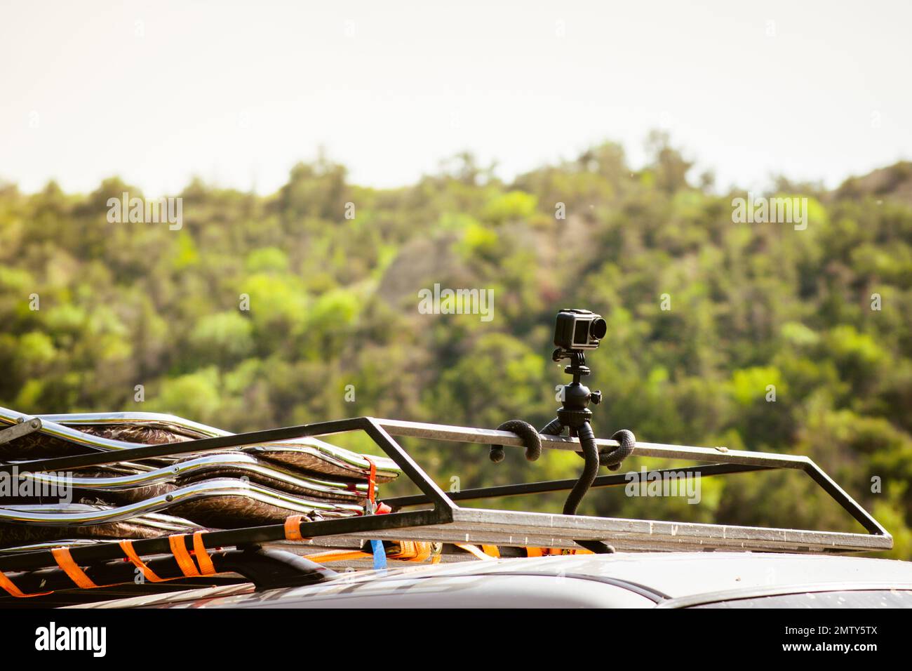 Action sports camera on rooftop attached with gorilla tripod ready ...