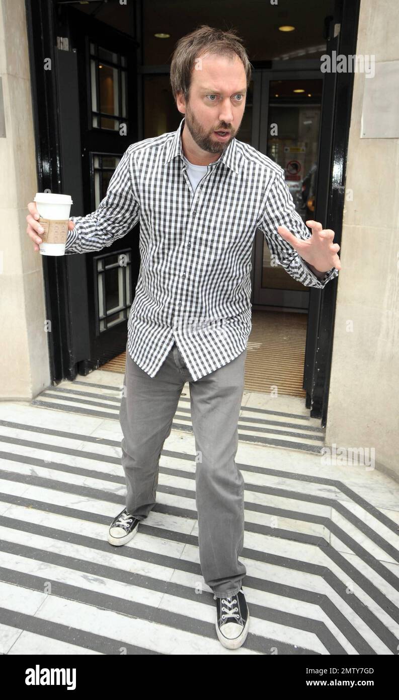 Actor and comedian Tom Green hams it up for the cameras while carrying ...