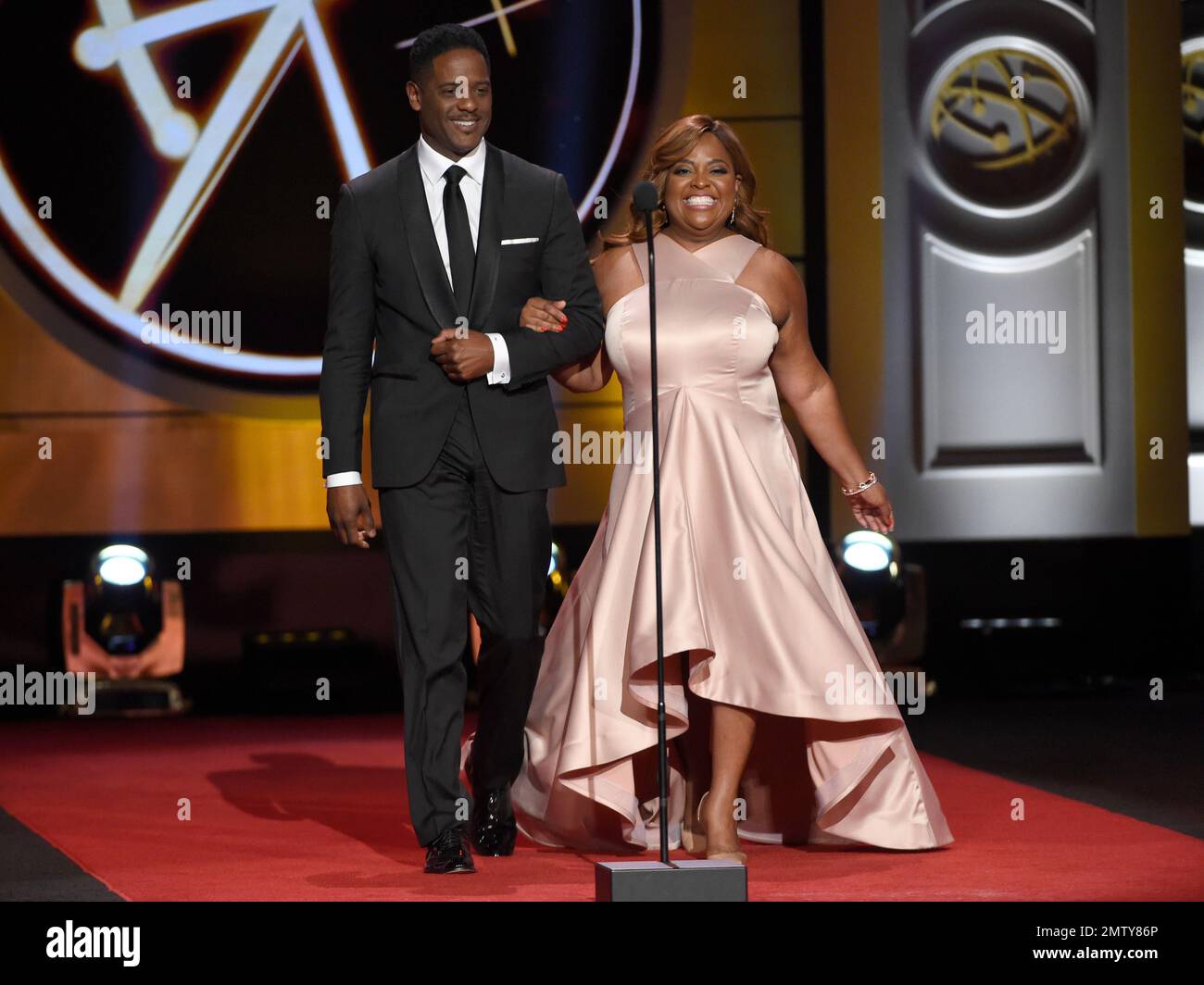 Blair Underwood, left, and Sherri Shepherd walk out on stage at the ...