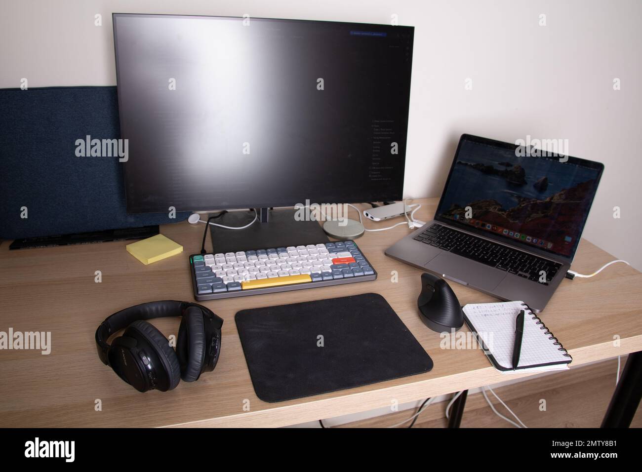 photo headphones, monitor, laptop , mouse pad, computer mouse on the ...