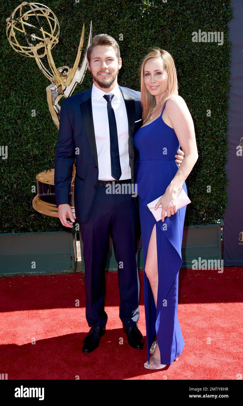 Scott Clifton, left, and Nicole Lampson arrive at the 44th Annual ...