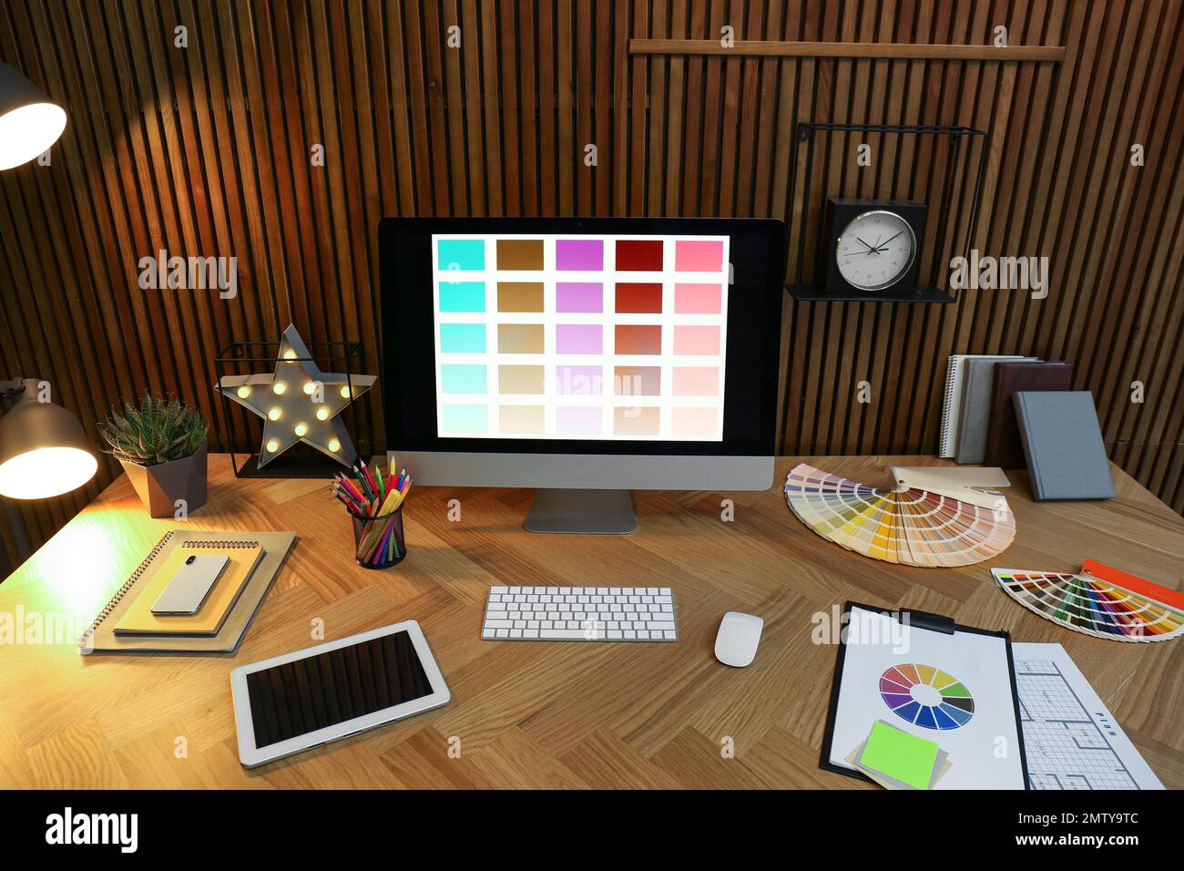 Modern designer's workplace with computer in office Stock Photo - Alamy