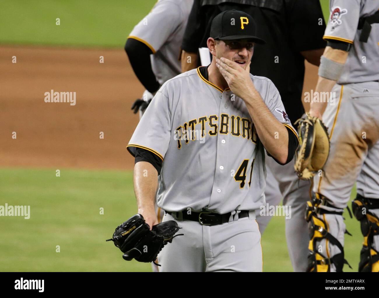Pittsburgh Pirates relief pitcher Daniel Hudson (41) walks from the ...