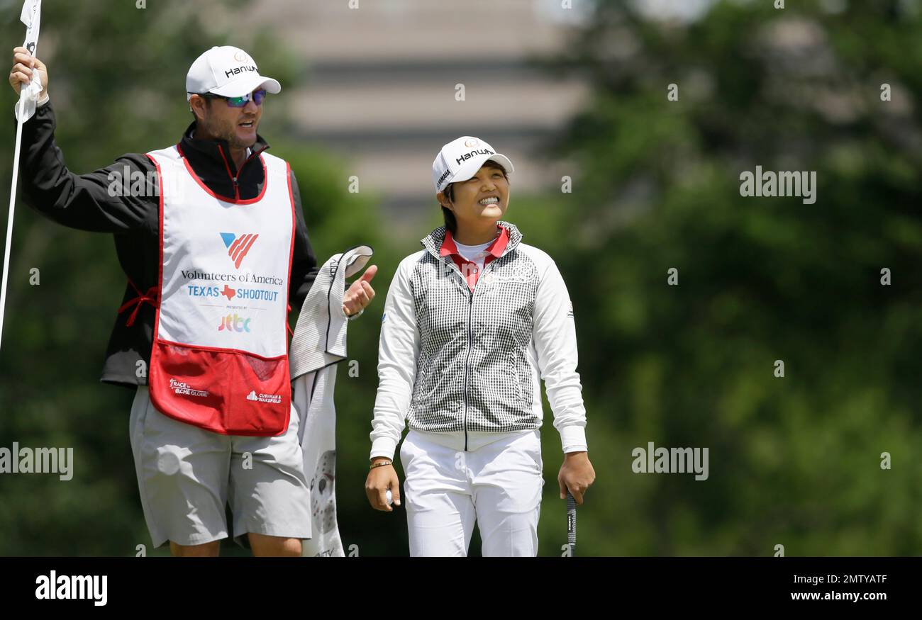 Haru Nomura of Japan, right, stands with her caddie Jason McDede before ...