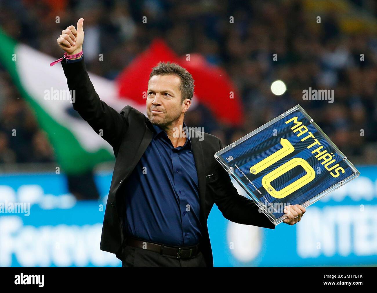Former soccer star Lothar Matthaus waves Inter Milan's supporters prior ...