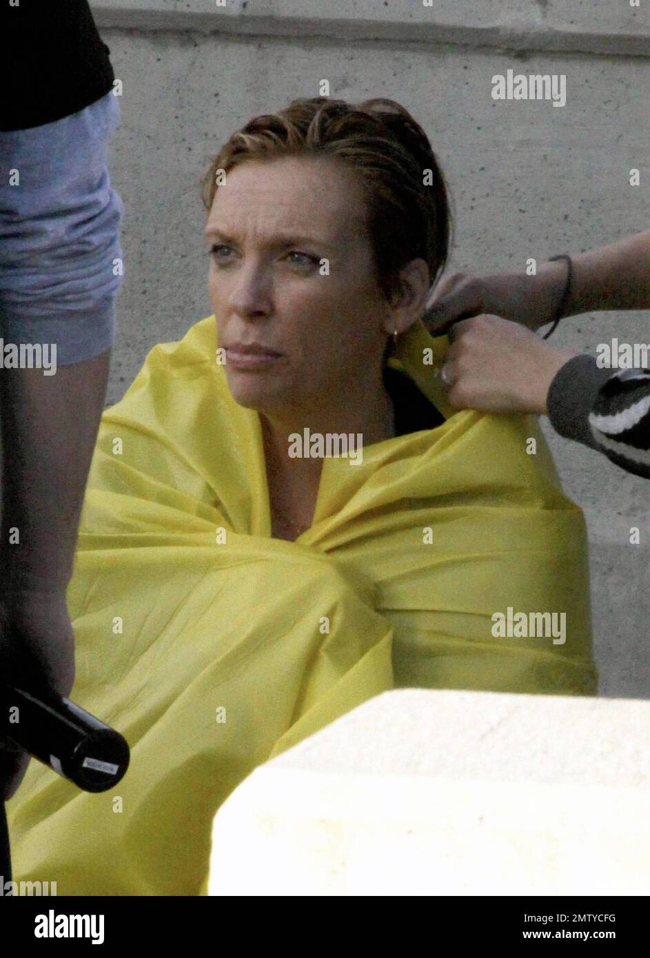 EXCLUSIVE!! Toni Collette covers up with a yellow tarp as she has some ...