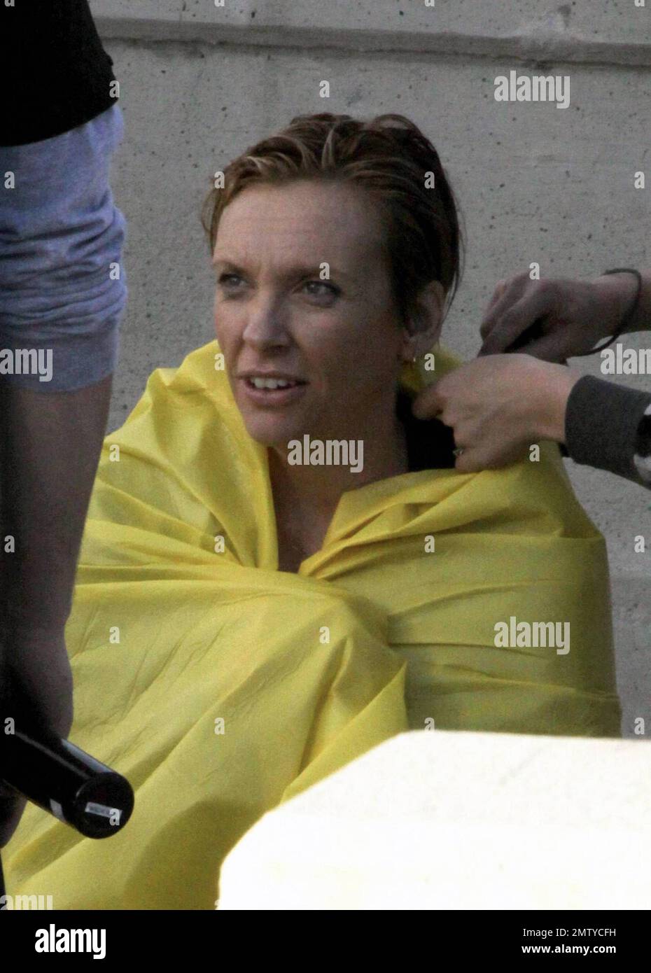 EXCLUSIVE!! Toni Collette covers up with a yellow tarp as she has some ...