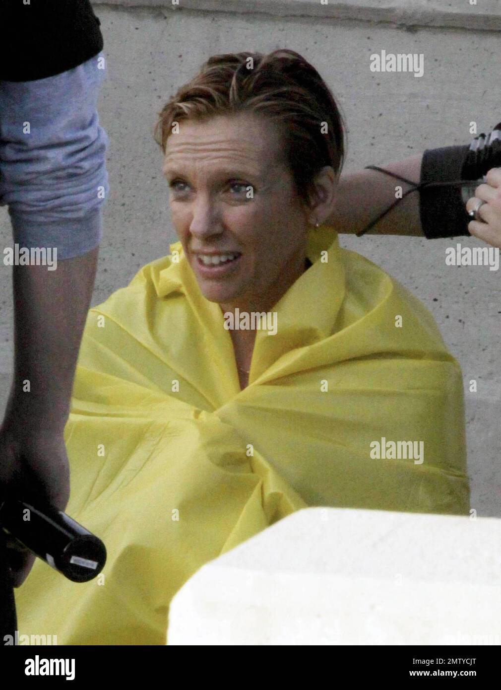 EXCLUSIVE!! Toni Collette covers up with a yellow tarp as she has some ...
