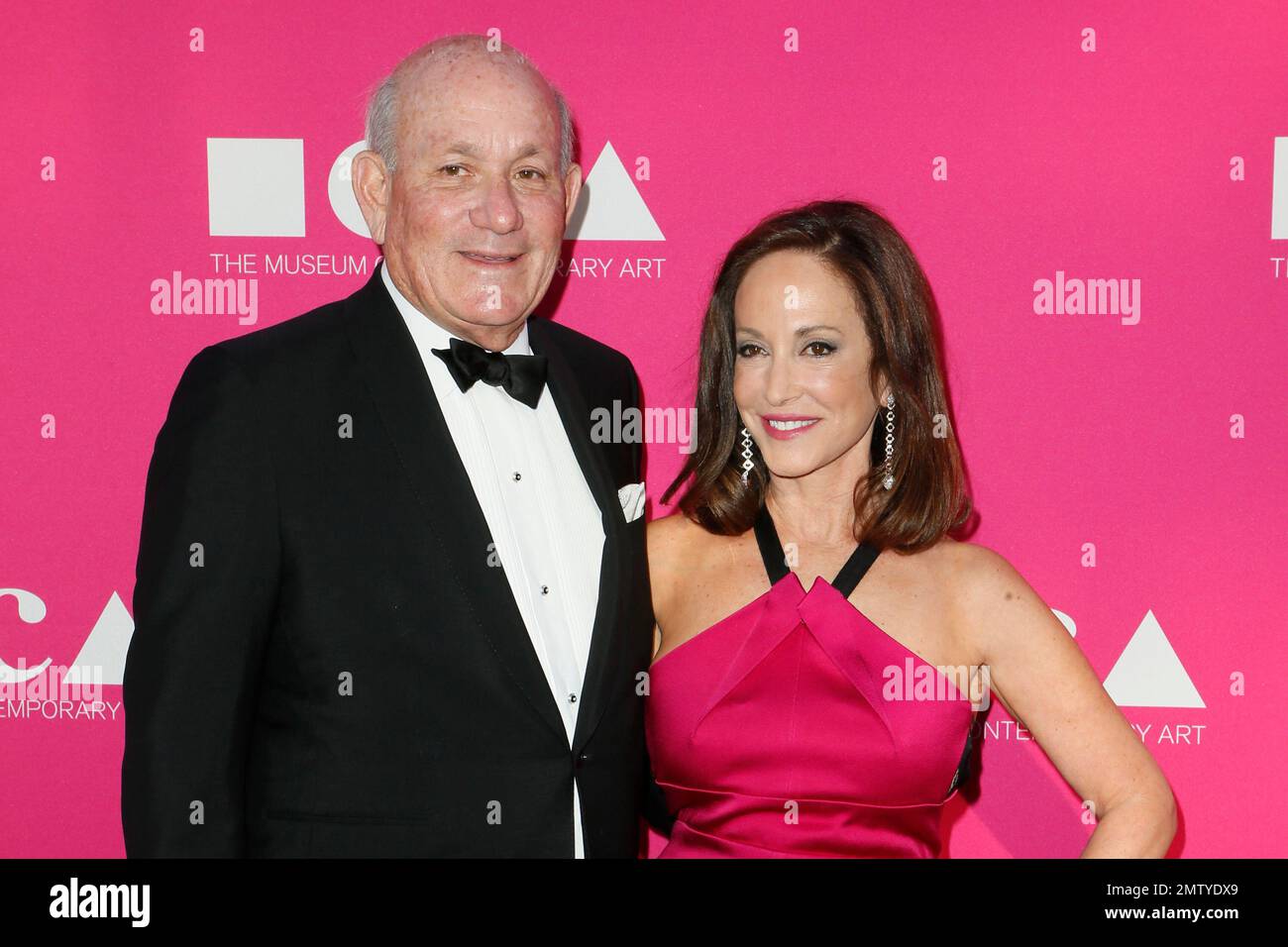 Bruce Karatz, left and MOCA Gala chair Lilly Tartikoff pose at The ...