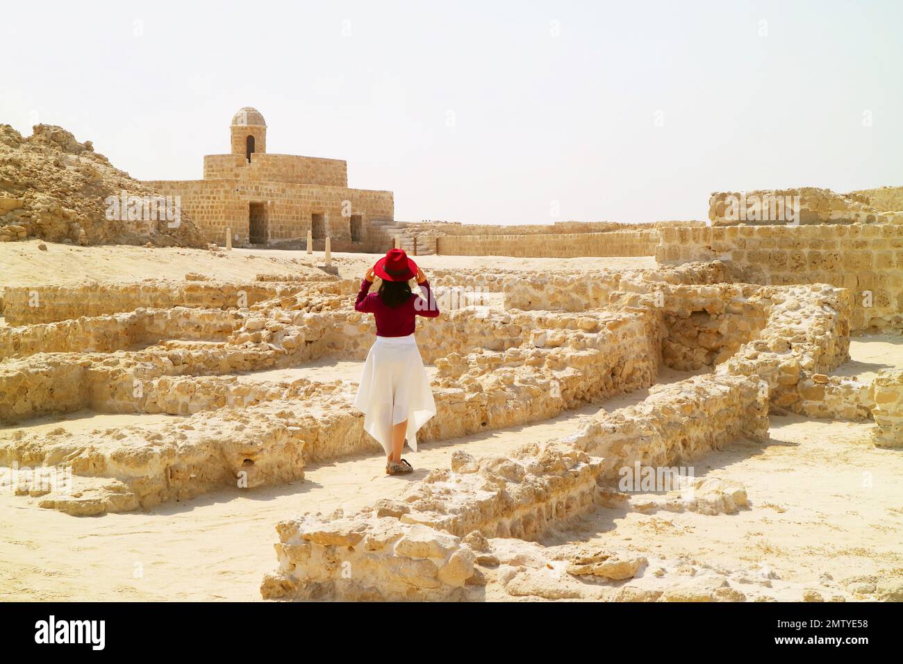 Female Visiting the Remains of the Bahrain Fort, the Ancient Harbour ...