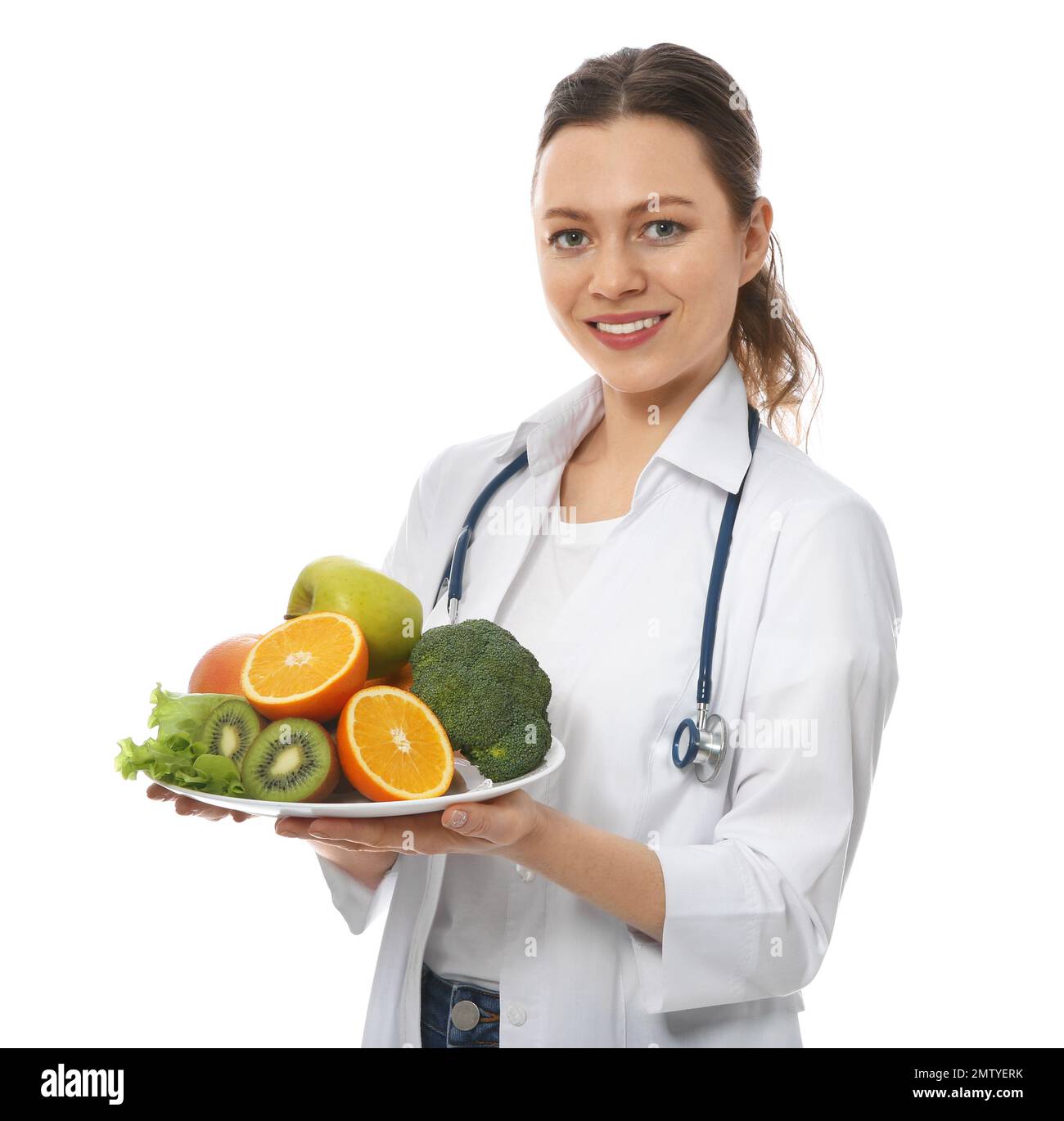 Nutritionist with fruits and vegetables on white background Stock Photo ...