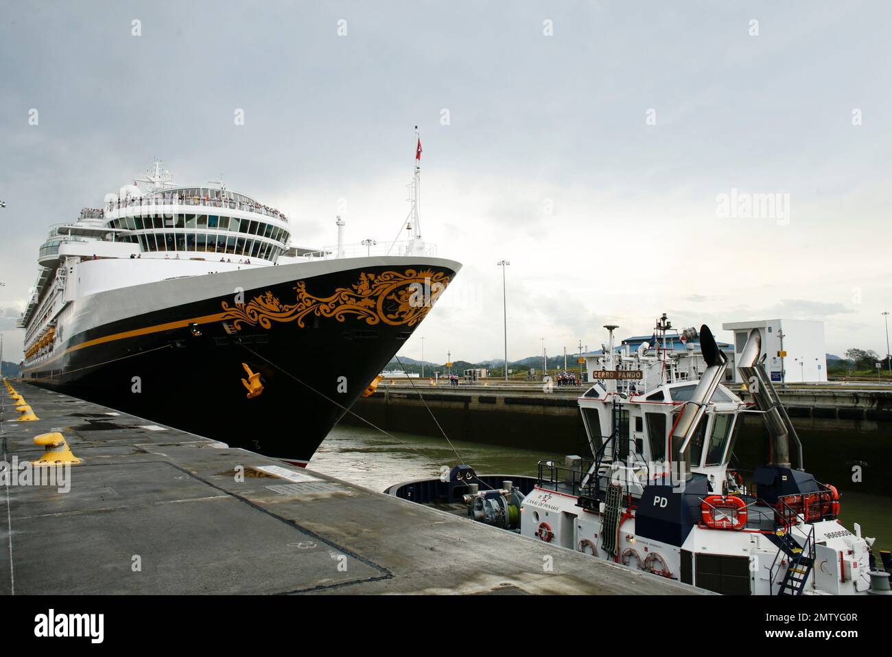The Disney Wonder cruise ship sails toward the Cocoli Locks, part of ...