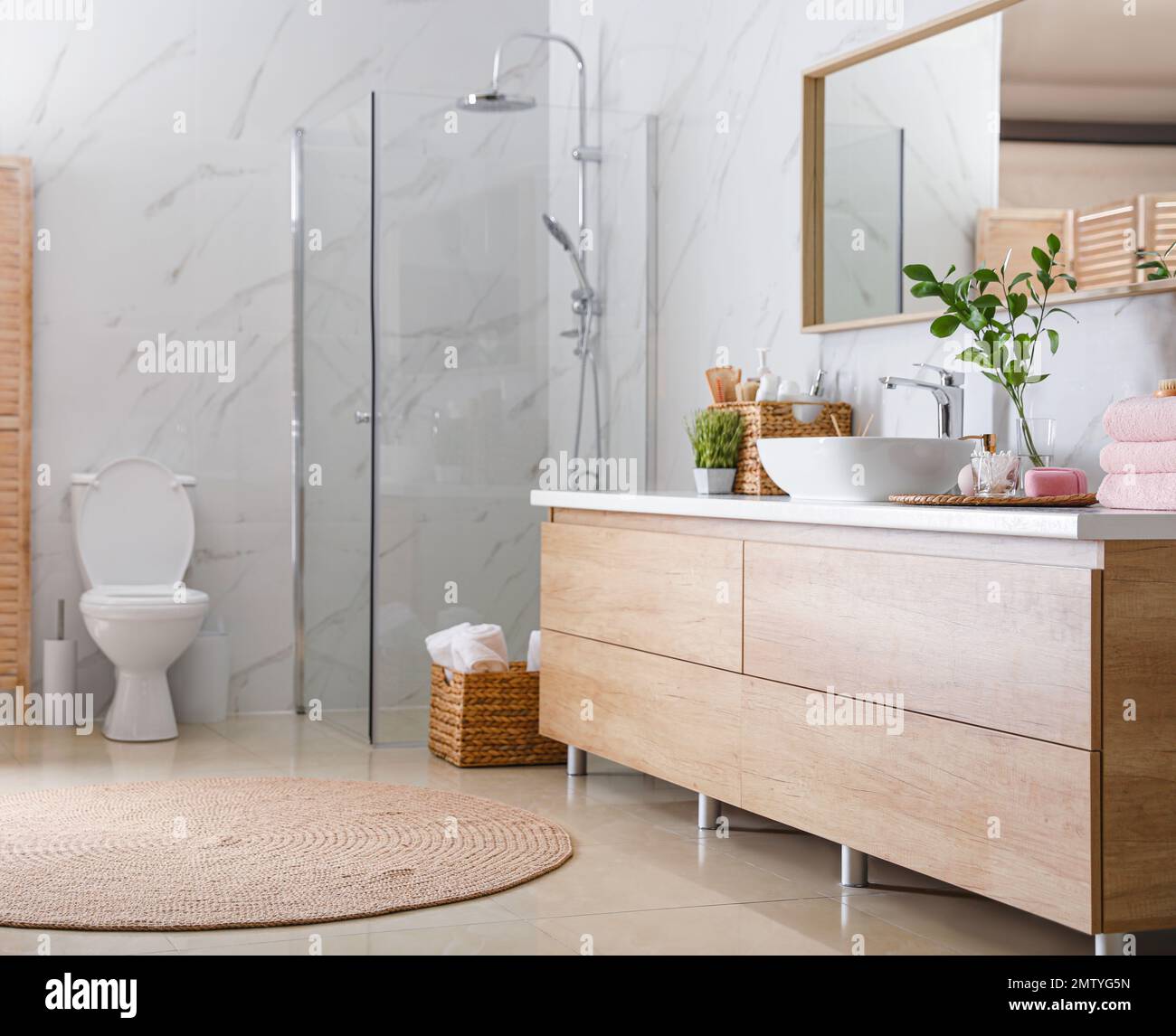 Interior of stylish bathroom with shower unit Stock Photo - Alamy