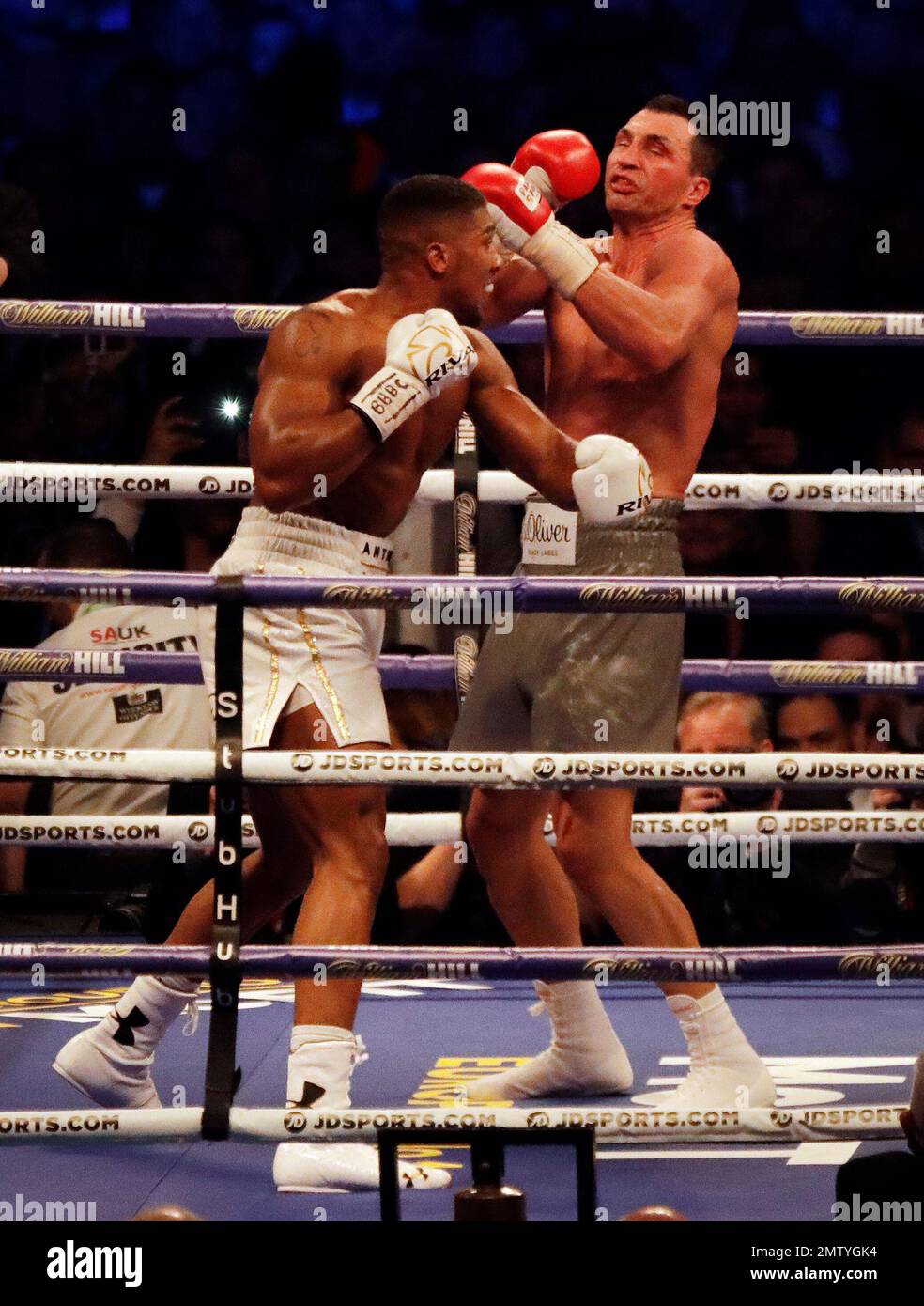 British boxer Anthony Joshua, left, fights Ukrainian boxer Wladimir ...