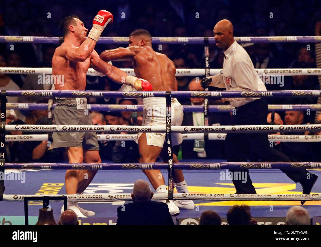 British boxer Anthony Joshua, right, fights Ukrainian boxer Wladimir ...