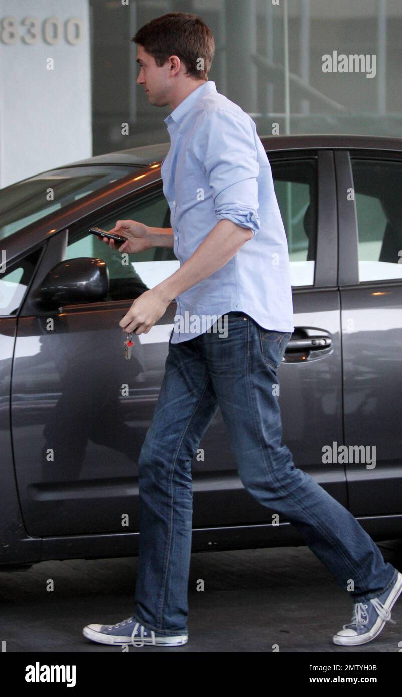 EXCLUSIVE!! Topher Grace leaves an LA hotel with what appears to be a ...