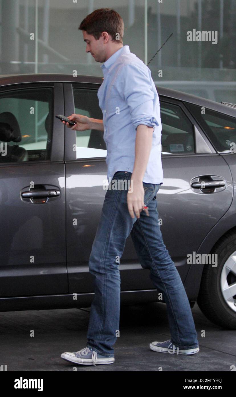 EXCLUSIVE!! Topher Grace leaves an LA hotel with what appears to be a ...