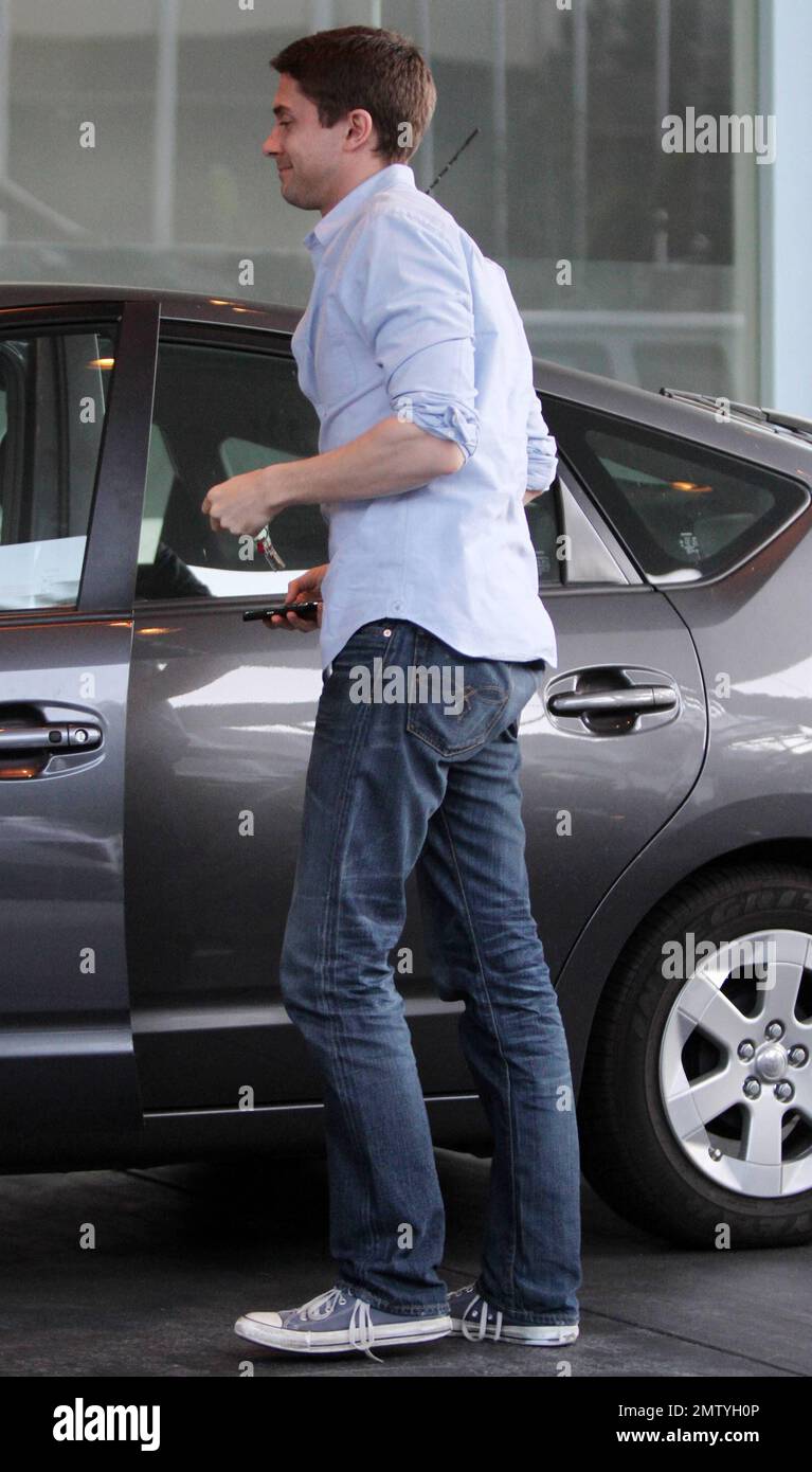 EXCLUSIVE!! Topher Grace leaves an LA hotel with what appears to be a ...