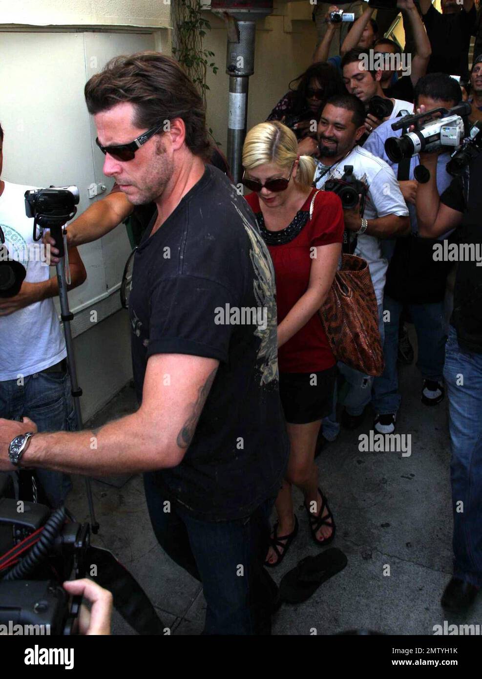 Tori Spelling and Dean McDermott cause a stir amongst the large throng ...