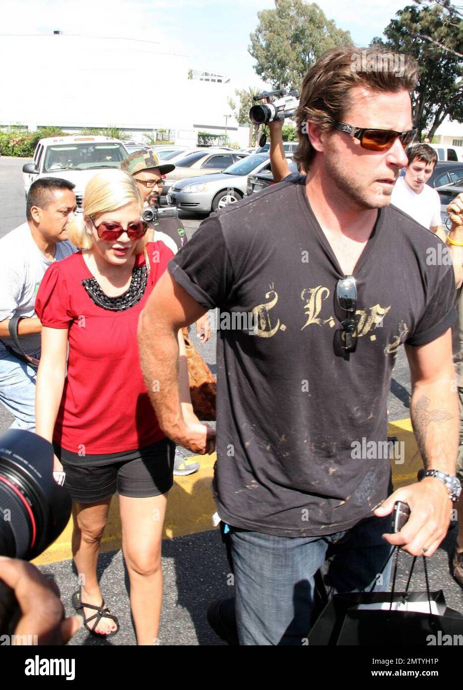 Tori Spelling and Dean McDermott cause a stir amongst the large throng ...