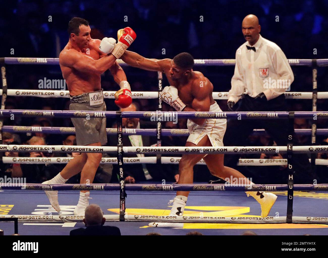 British boxer Anthony Joshua, right, fights Ukrainian boxer Wladimir ...