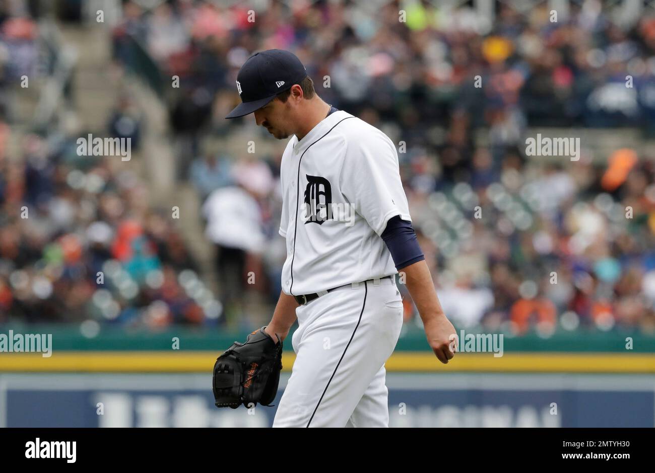 Detroit Tigers relief pitcher Blaine Hardy walks to the dugout after ...