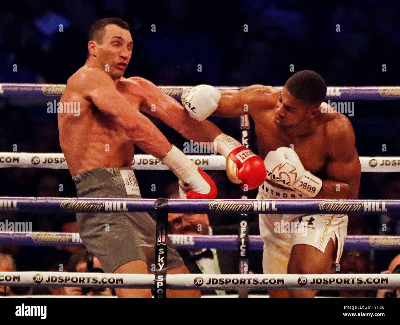 British boxer Anthony Joshua, right, fights Ukrainian boxer Wladimir ...