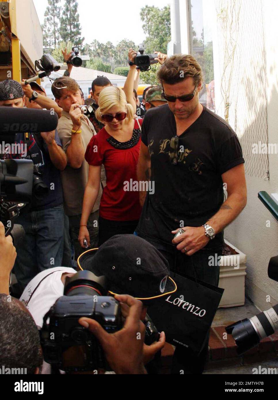 Tori Spelling and Dean McDermott cause a stir amongst the large throng ...