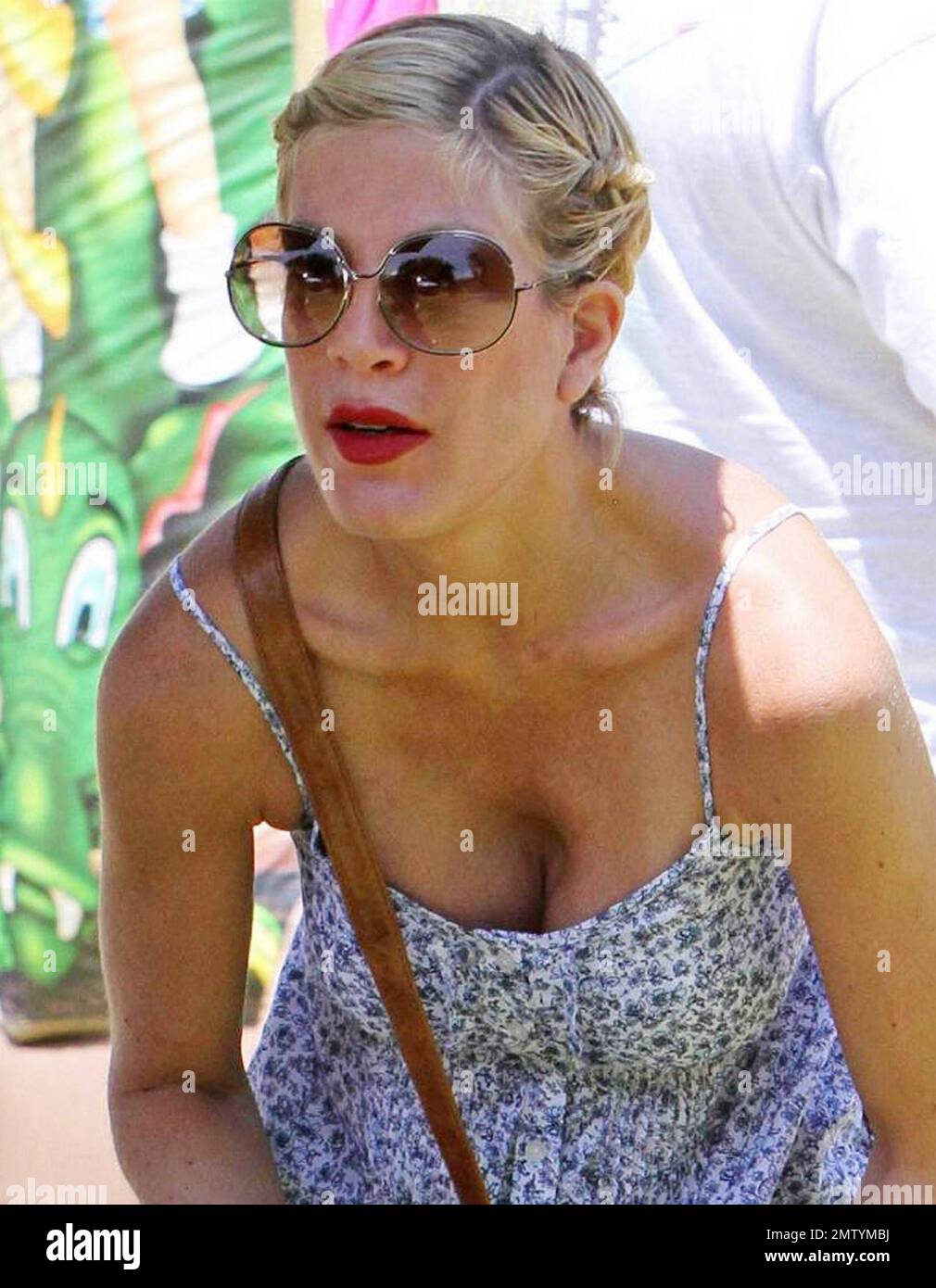 Tori Spelling and husband Dean McDermott spend the day at a Los Angeles farmer's market with ...