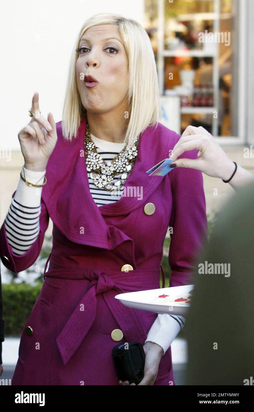 Tori Spelling and co-host Jeff Lewis interview shoppers at The Grove ...