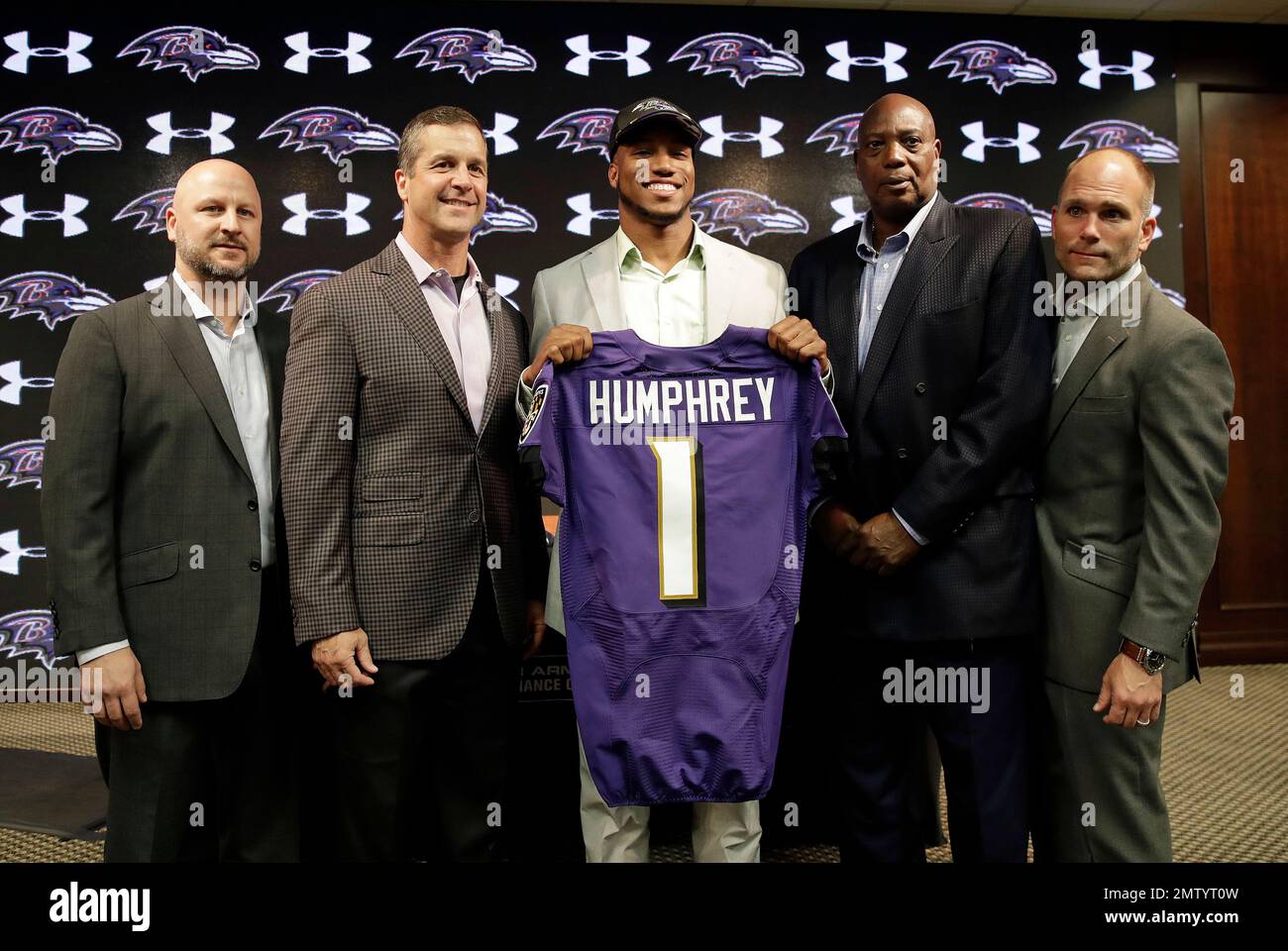Cornerback Marlon Humphrey, center, the Baltimore Ravens' first-round ...