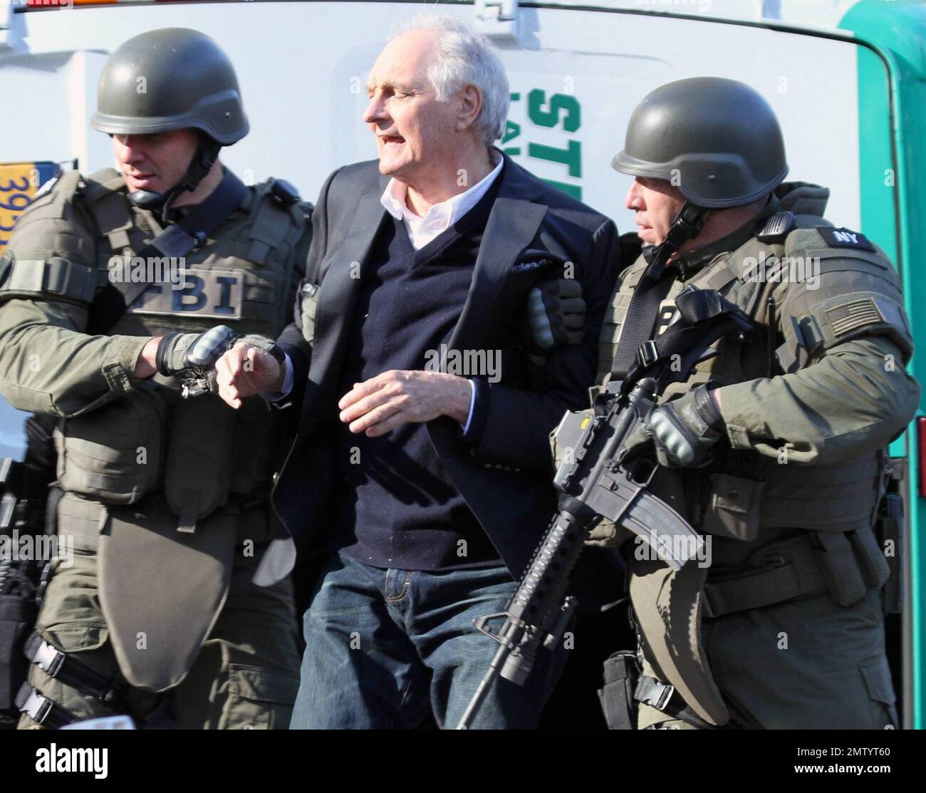 Actor Alan Alda show off fake blood on his head and is dragged by ...