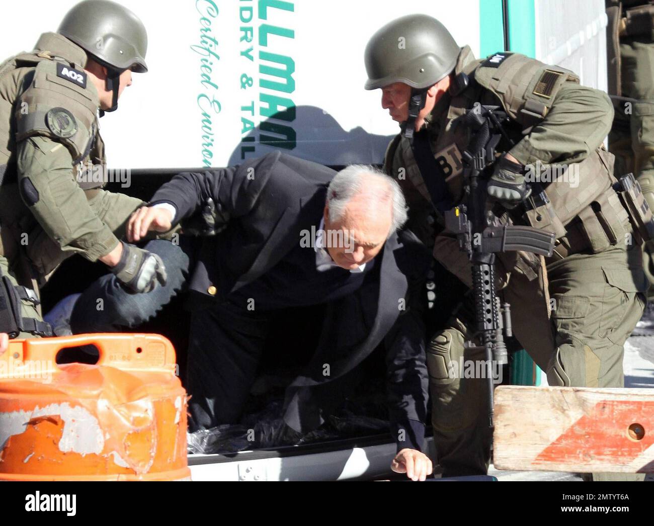 Actor Alan Alda show off fake blood on his head and is dragged by ...