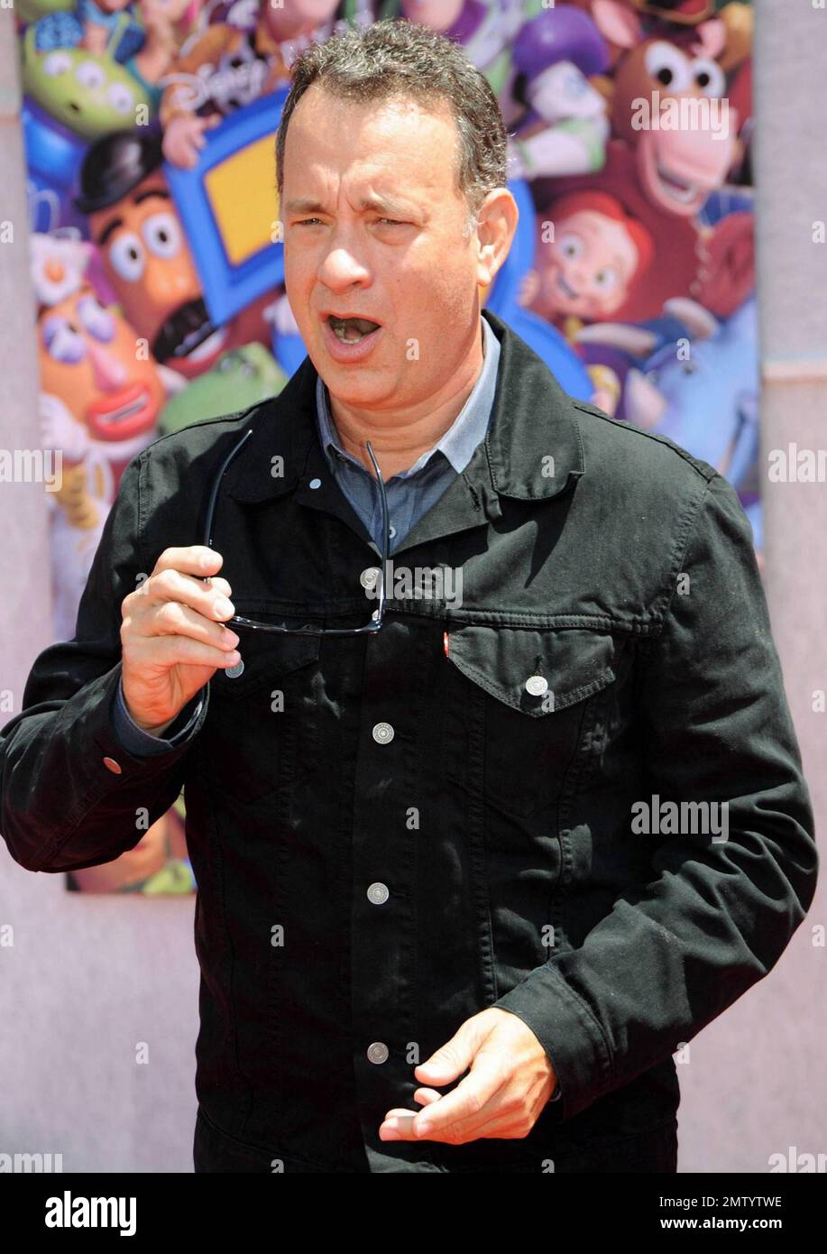 Tom Hanks walks the red carpet at the premiere of "Toy Story 3" held at ...
