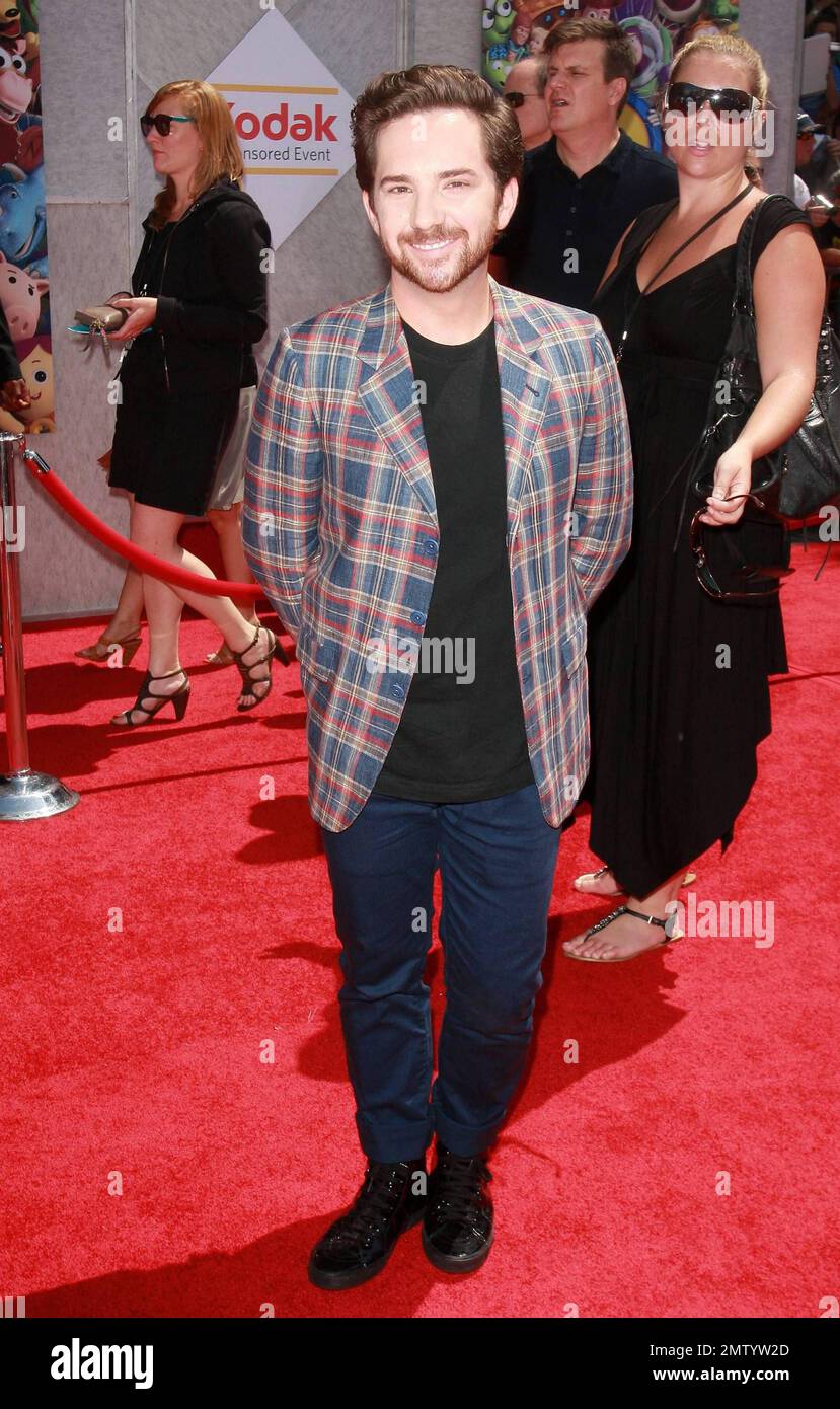 John Morris walks the red carpet at the premiere of "Toy Story 3" held ...