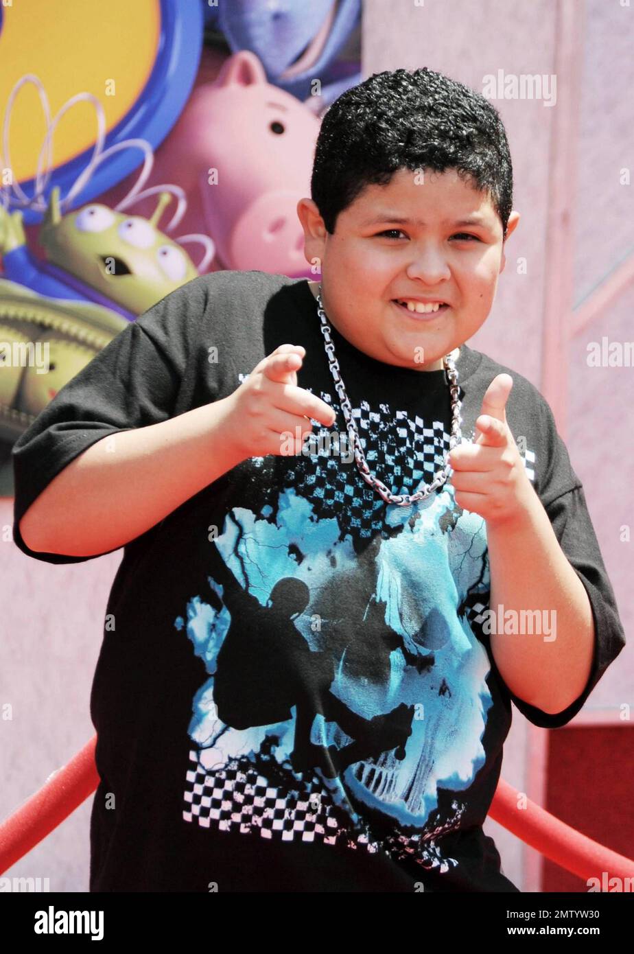 Rico Rodriguez walks the red carpet at the premiere of "Toy Story 3 ...