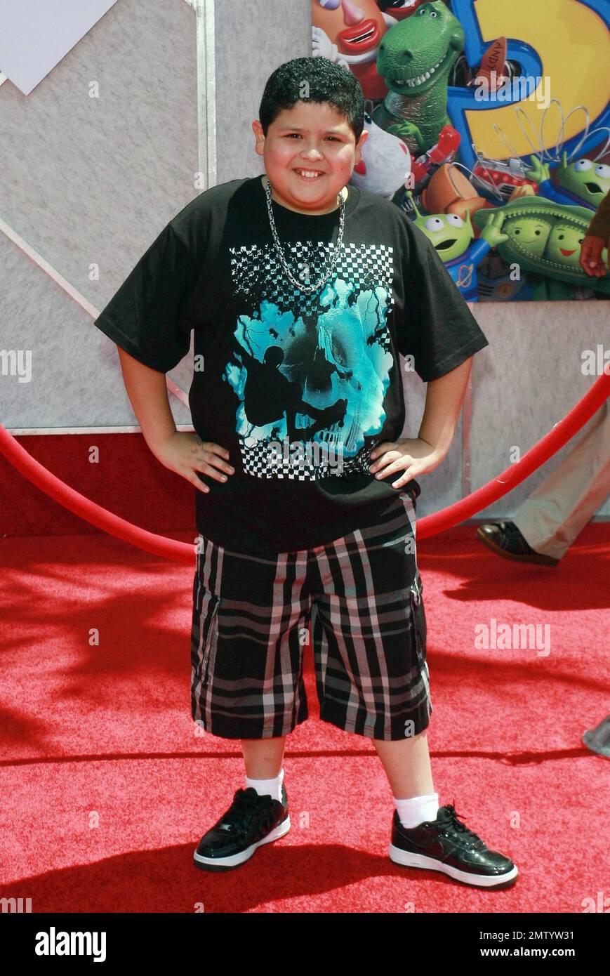 Rico Rodriguez walks the red carpet at the premiere of "Toy Story 3 ...