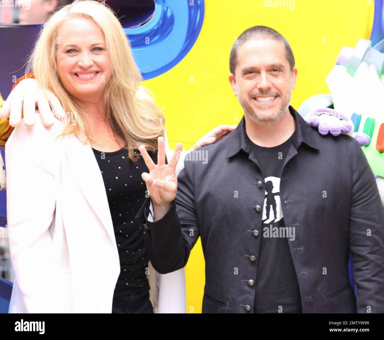 Producer Darla K. Anderson and "Toy Story 3" director Lee Unkrich walk ...