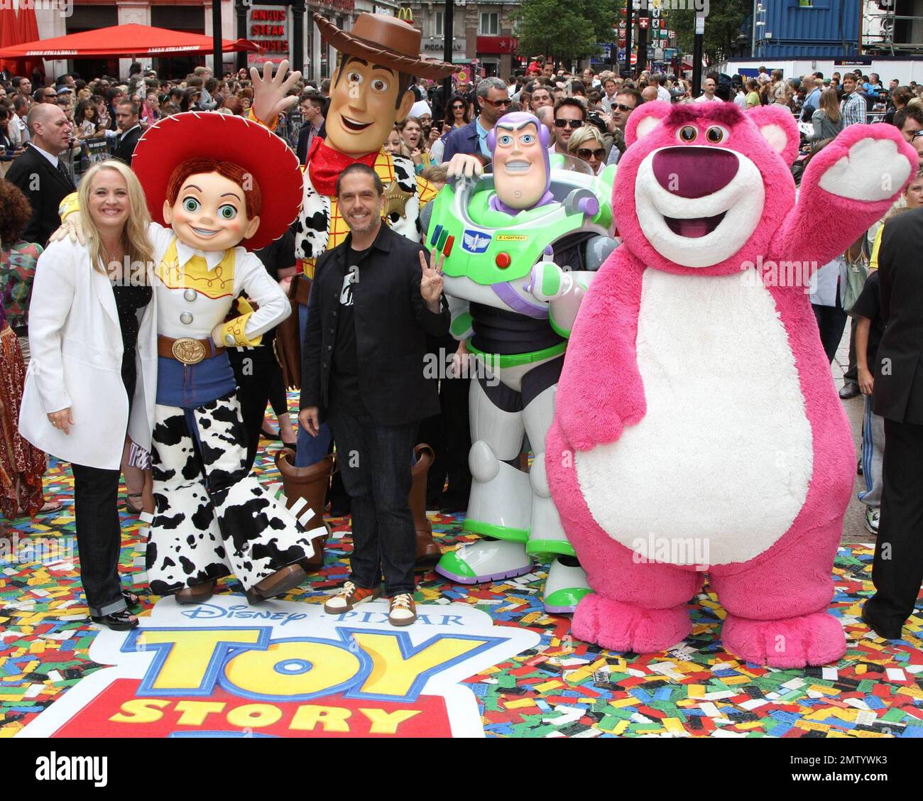 Producer Darla K. Anderson and "Toy Story 3" director Lee Unkrich walk ...