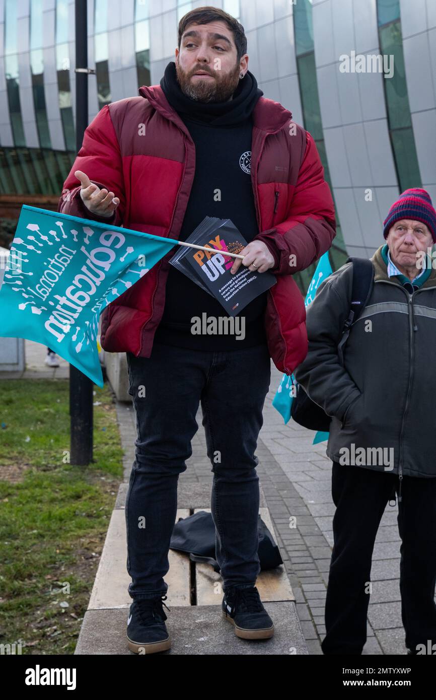 Slough, UK. 1st February, 2023. A local teacher addresses a strike ...