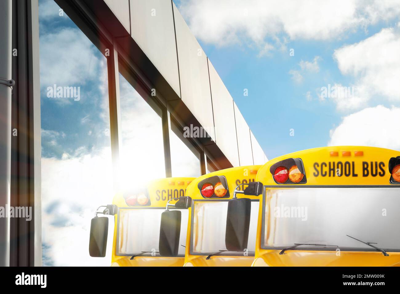 Yellow school buses outdoors. Transport for students Stock Photo - Alamy