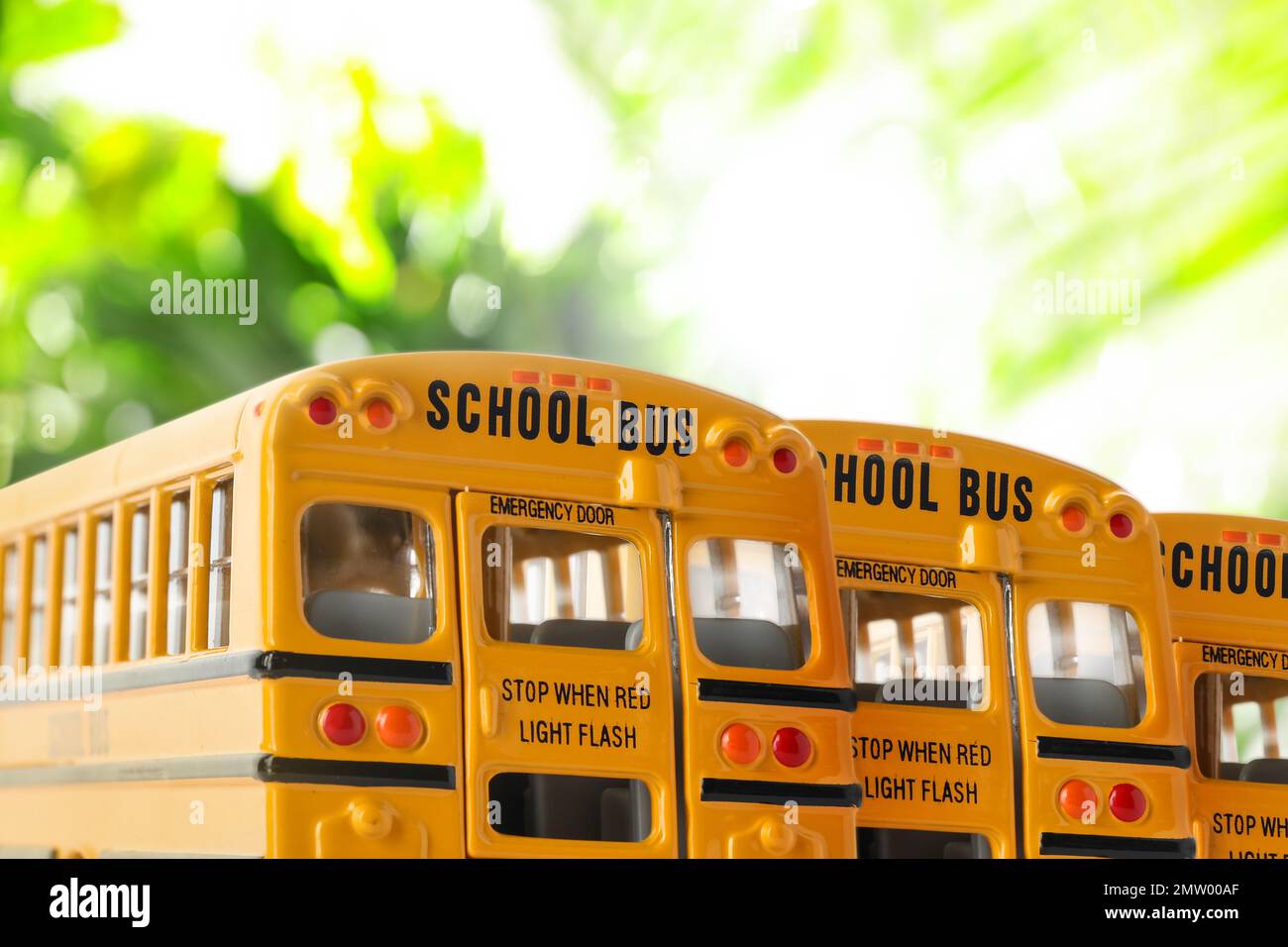 Yellow school buses outdoors. Transport for students Stock Photo - Alamy