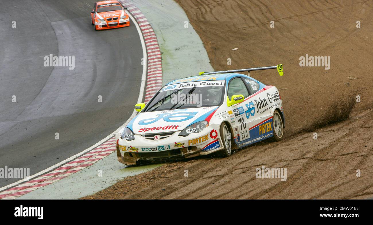 Andrew Jordan goes wide into the gravel at Paddock Hill in the John ...