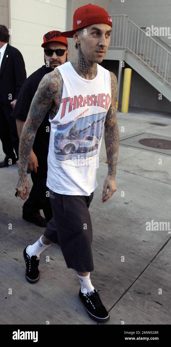 Blink-182 drummer Travis Barker greets fans and signs autographs as he ...