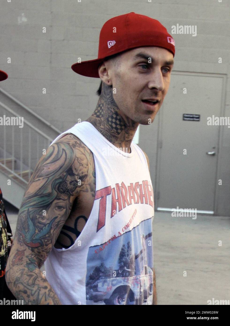 Blink-182 drummer Travis Barker greets fans and signs autographs as he ...