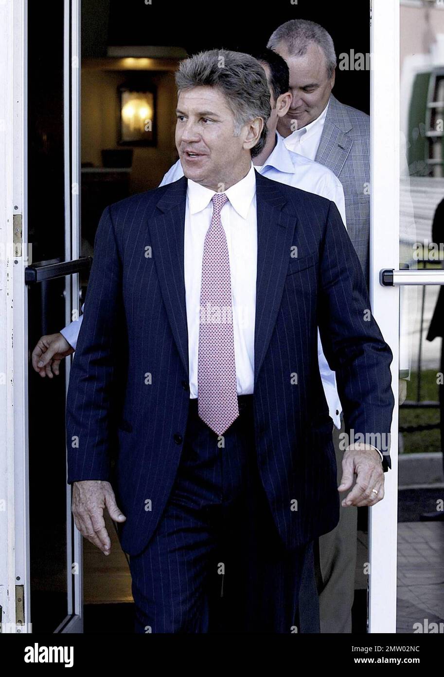 John Travolta's attorney Michael McDermott leaves the courthouse after ...