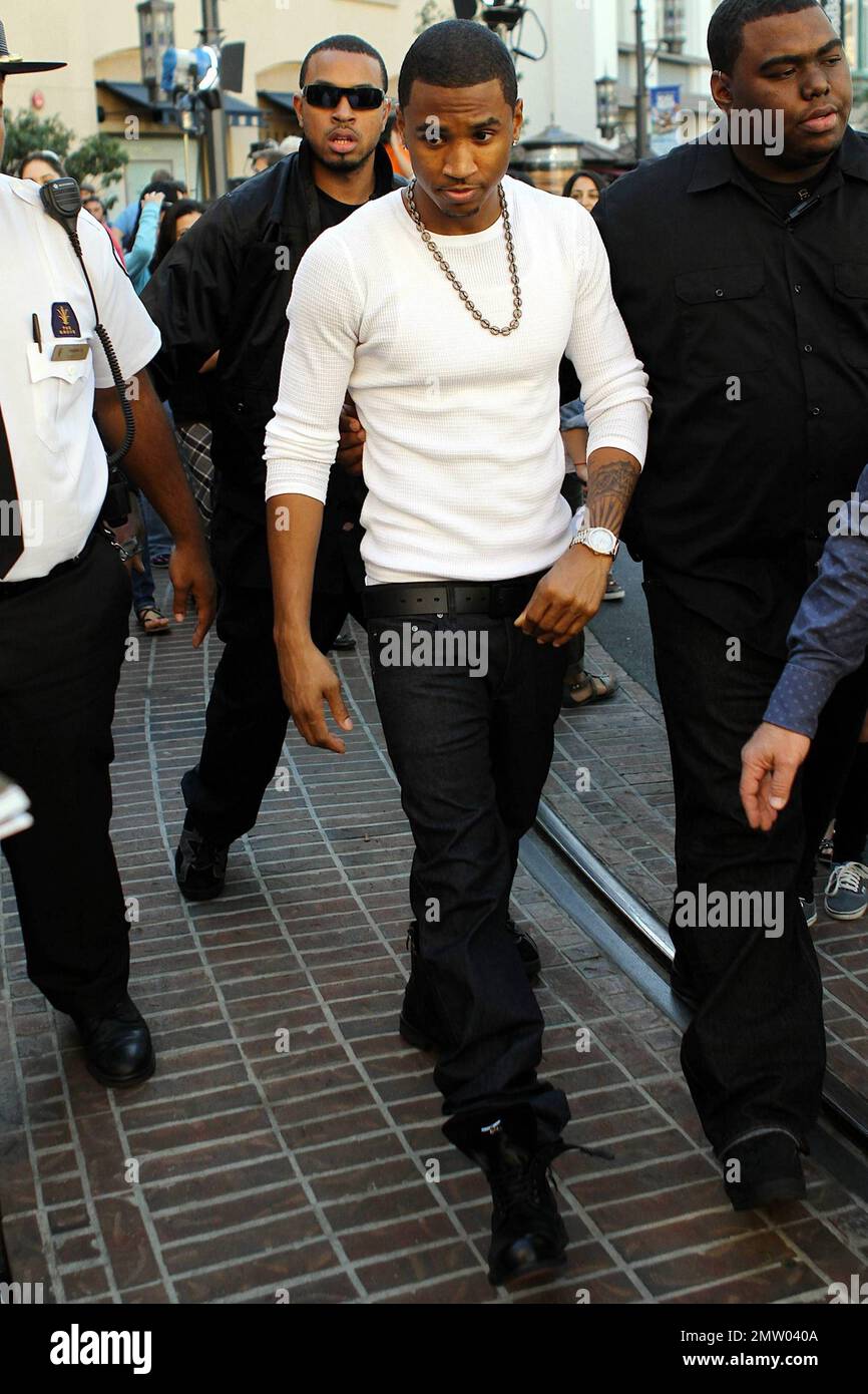 Accompanied by security, Trey Songz spends some time out and about at ...