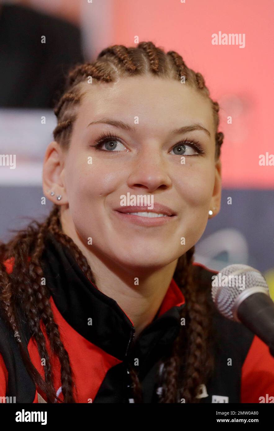 German boxer Nina Meinke speaks during a press conference in London ...