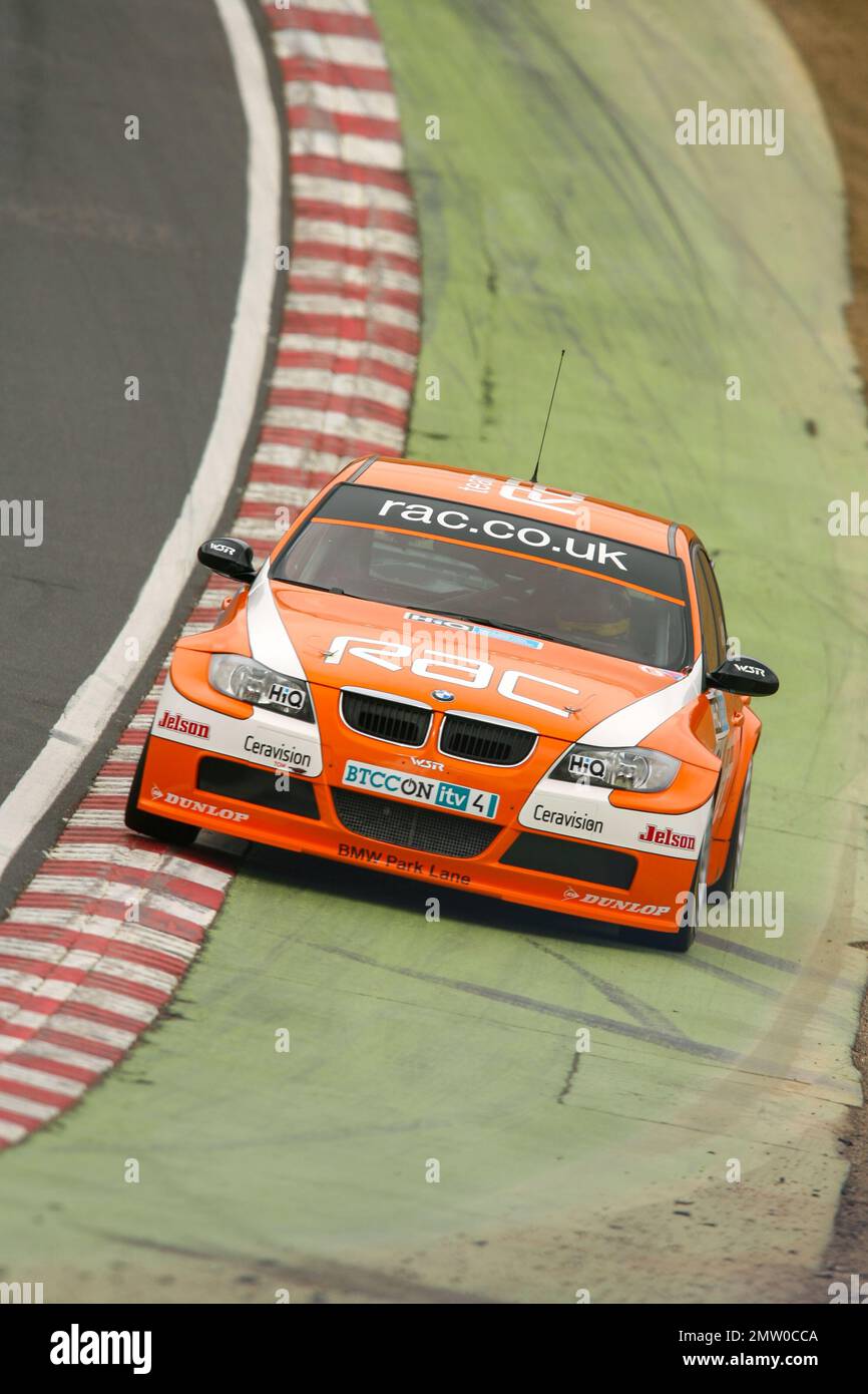 Stephen Jelley on Brands Hatch driving the orange Team RAC BMW during ...